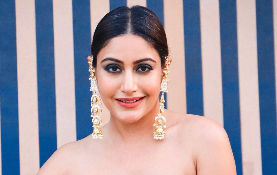Surbhi Chandna showed boldness in a half shoulder transparent shiny ...